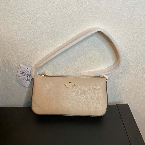 kate spade | Bags | Kate Spade Ivory Convertible Wristlet | Poshmark